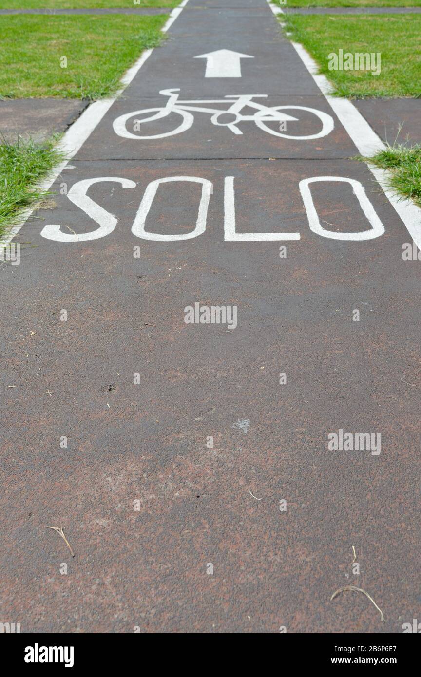 Bike ride only sign painted on the ground Stock Photo - Alamy