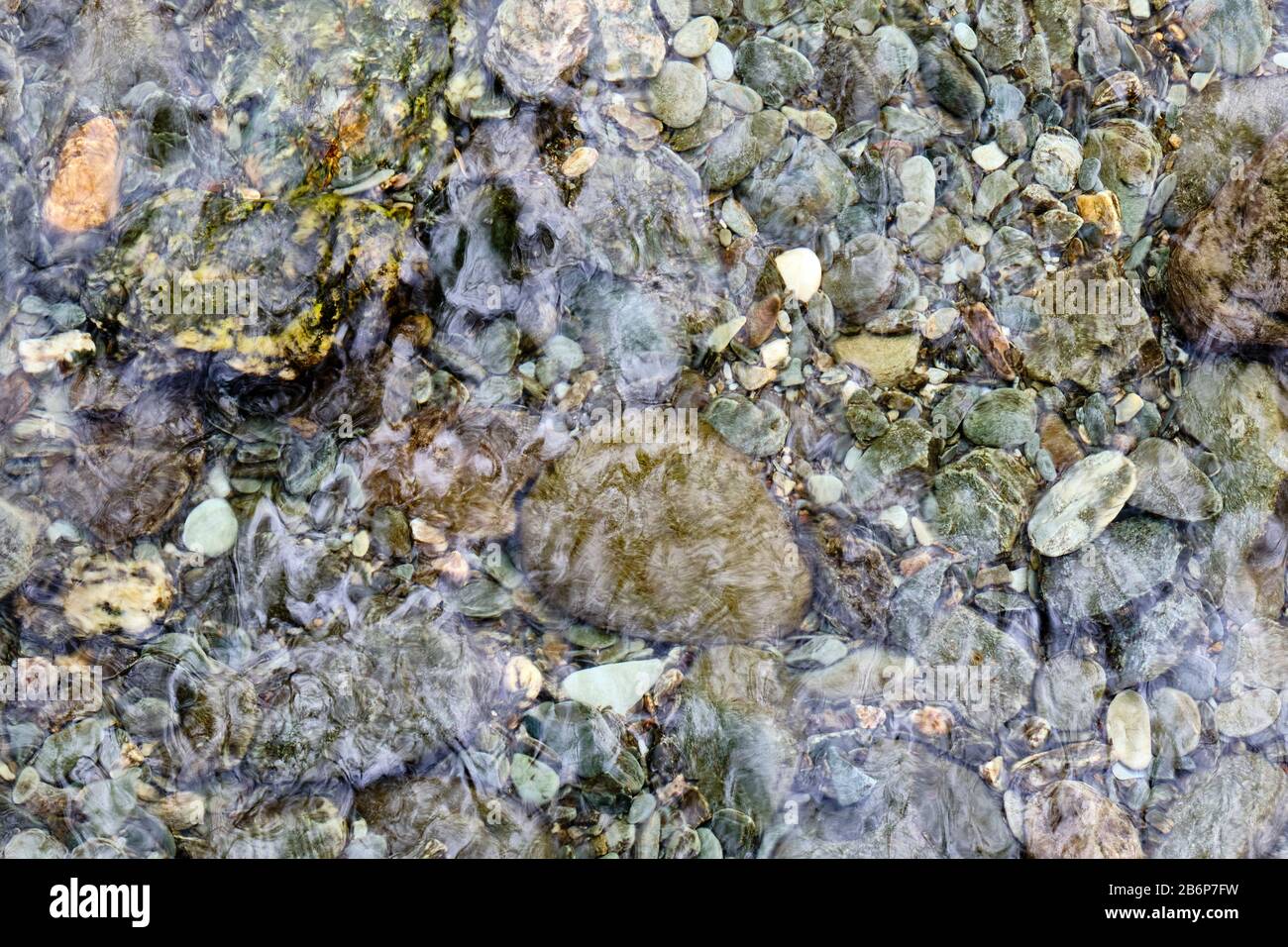 The clear waters of the Ledard Burn just before it flows into Loch Ard ...