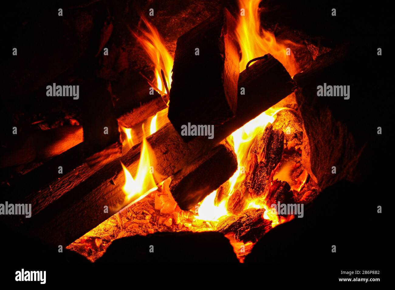 Macro shot of burning firewood with an open flame. Fire close Stock ...