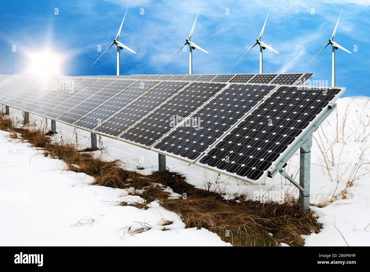 Photo collage of solar panels and wind turbins in winter with snow ...