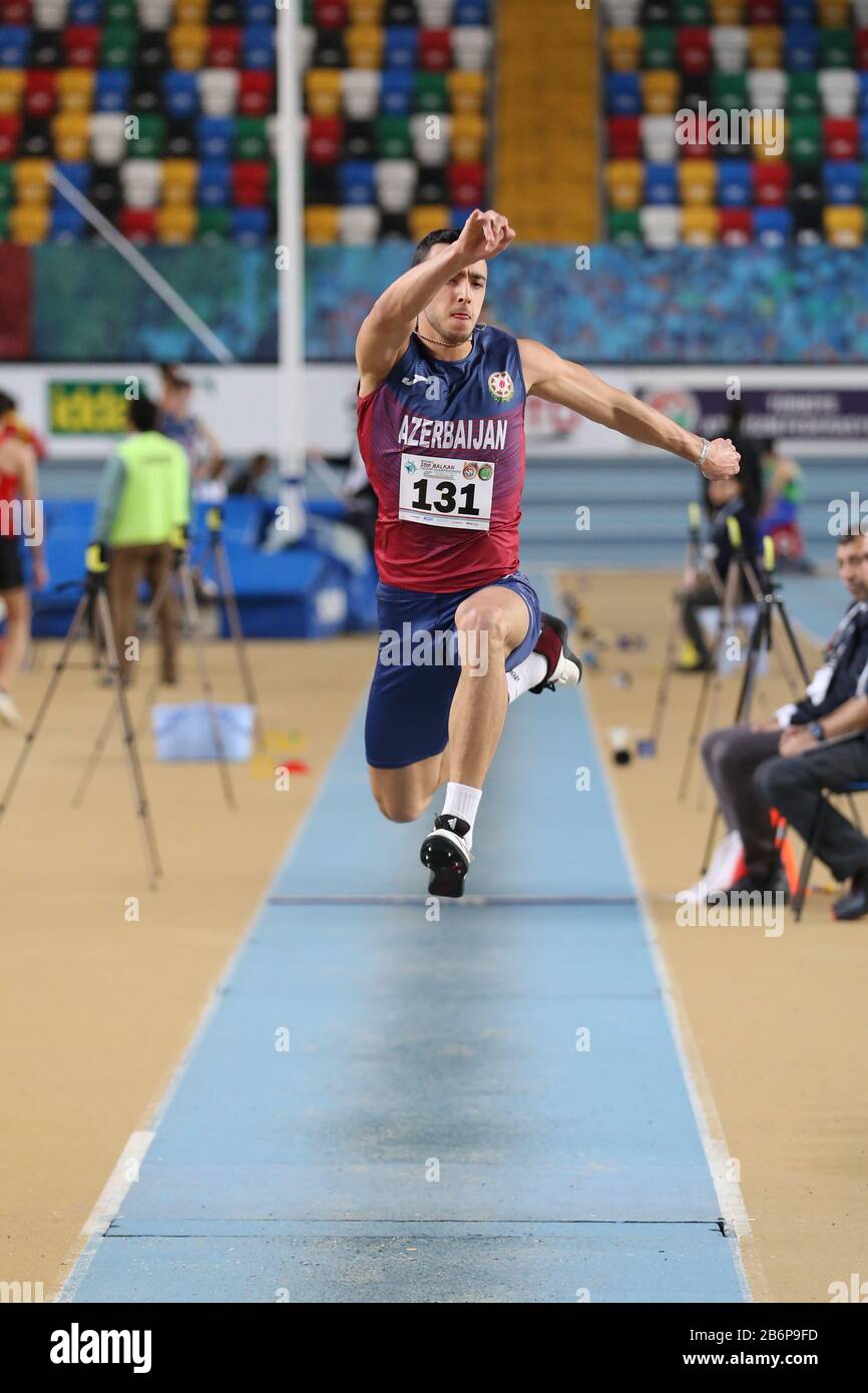ISTANBUL, TURKEY - FEBRUARY 15, 2020: Undefined athlete triple jumping ...