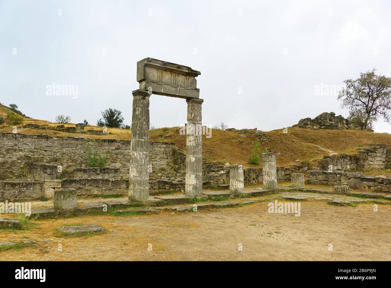 Ancient arch with carved stone portico-the ruins of the ancient Greek ...