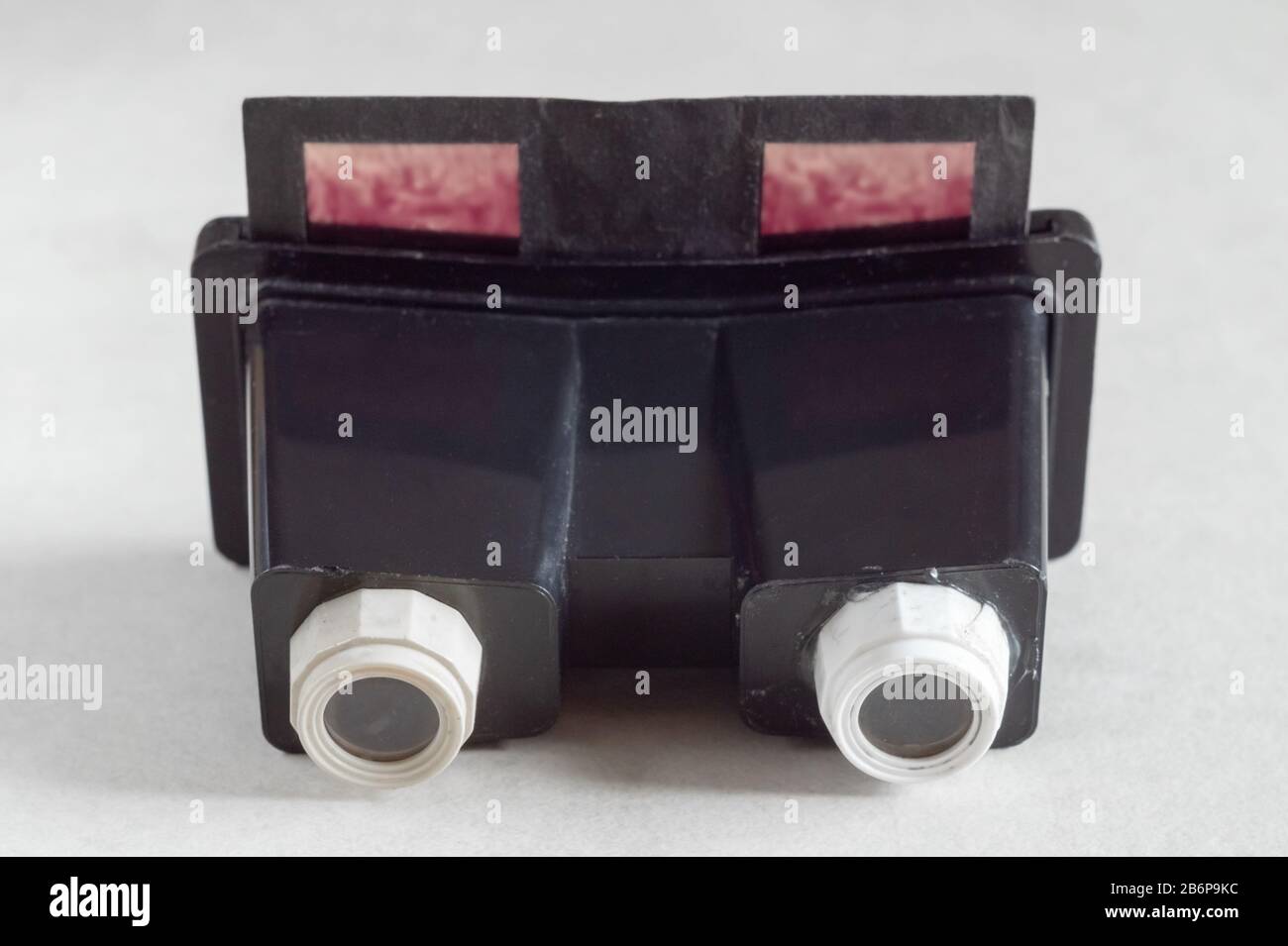 Outdated stereoscope with a stereo diapositiv cards. 3D viewing device ...