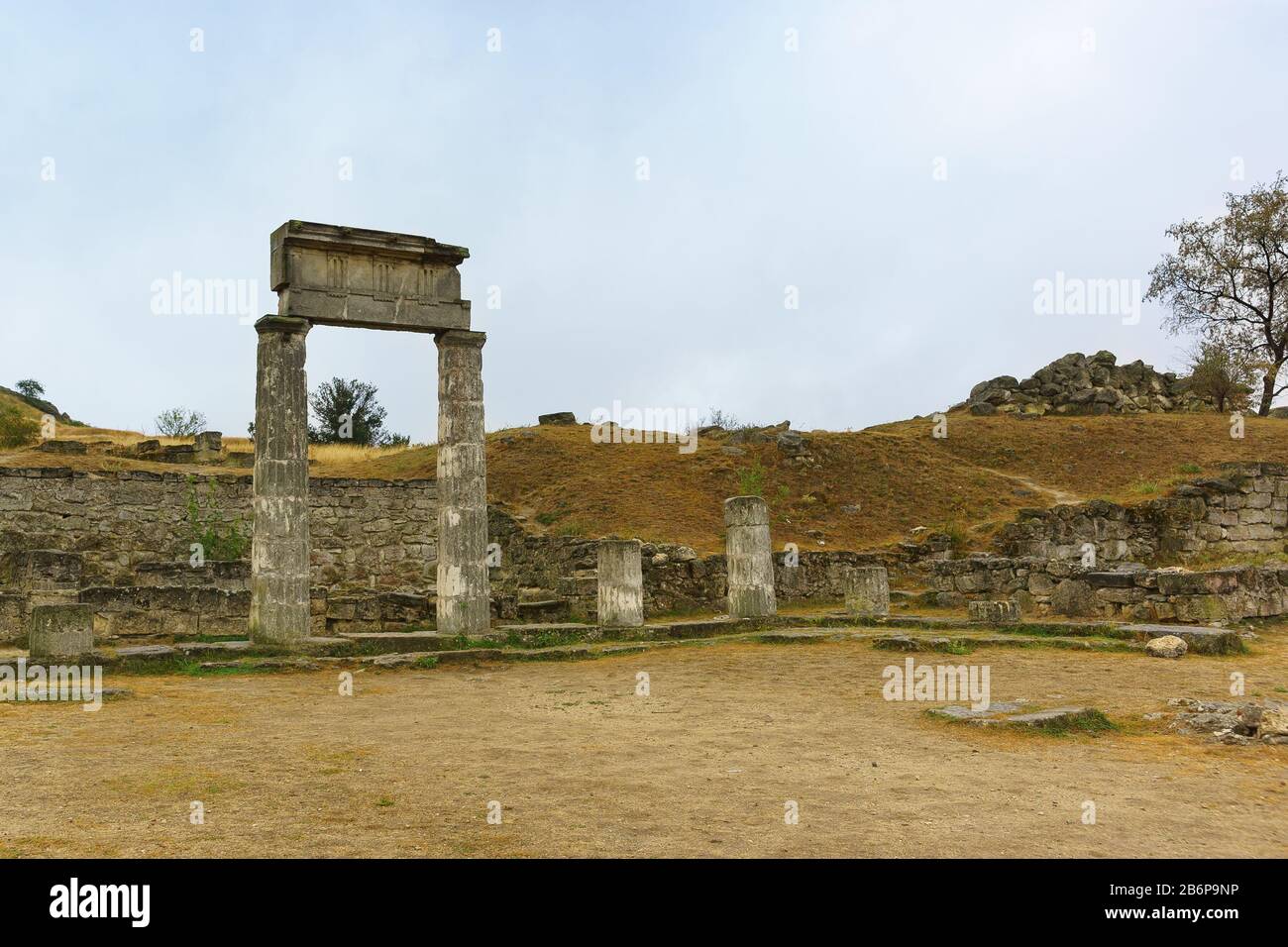 Ancient arch with carved stone portico-the ruins of the ancient Greek ...
