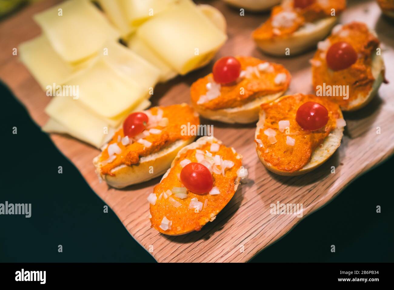 Vegetarian Finger Food with toast, orange hummus, cherry tomatoes and ...