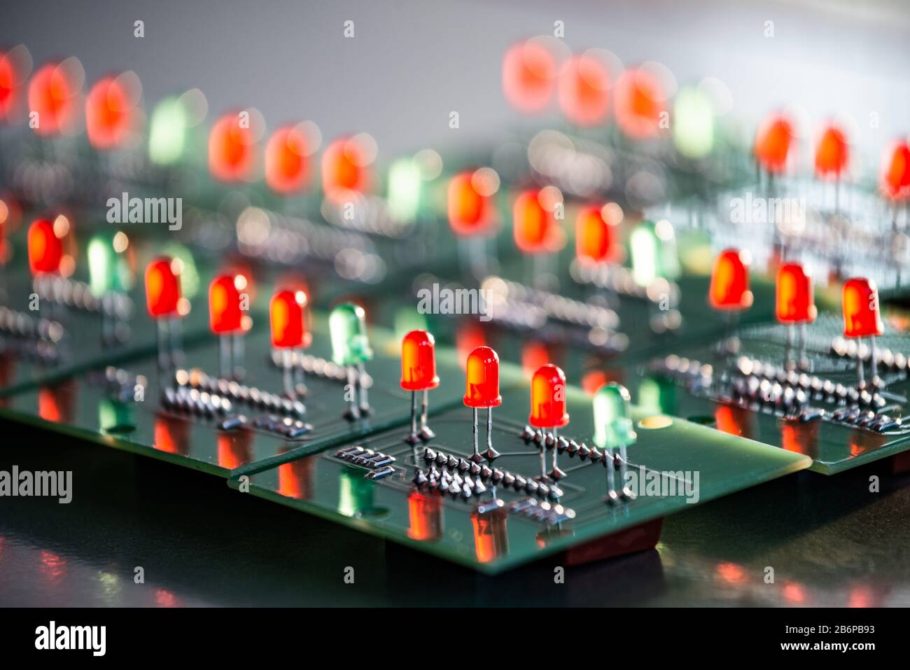 Close-up of a panel with red and green light bulbs indicators on a ...