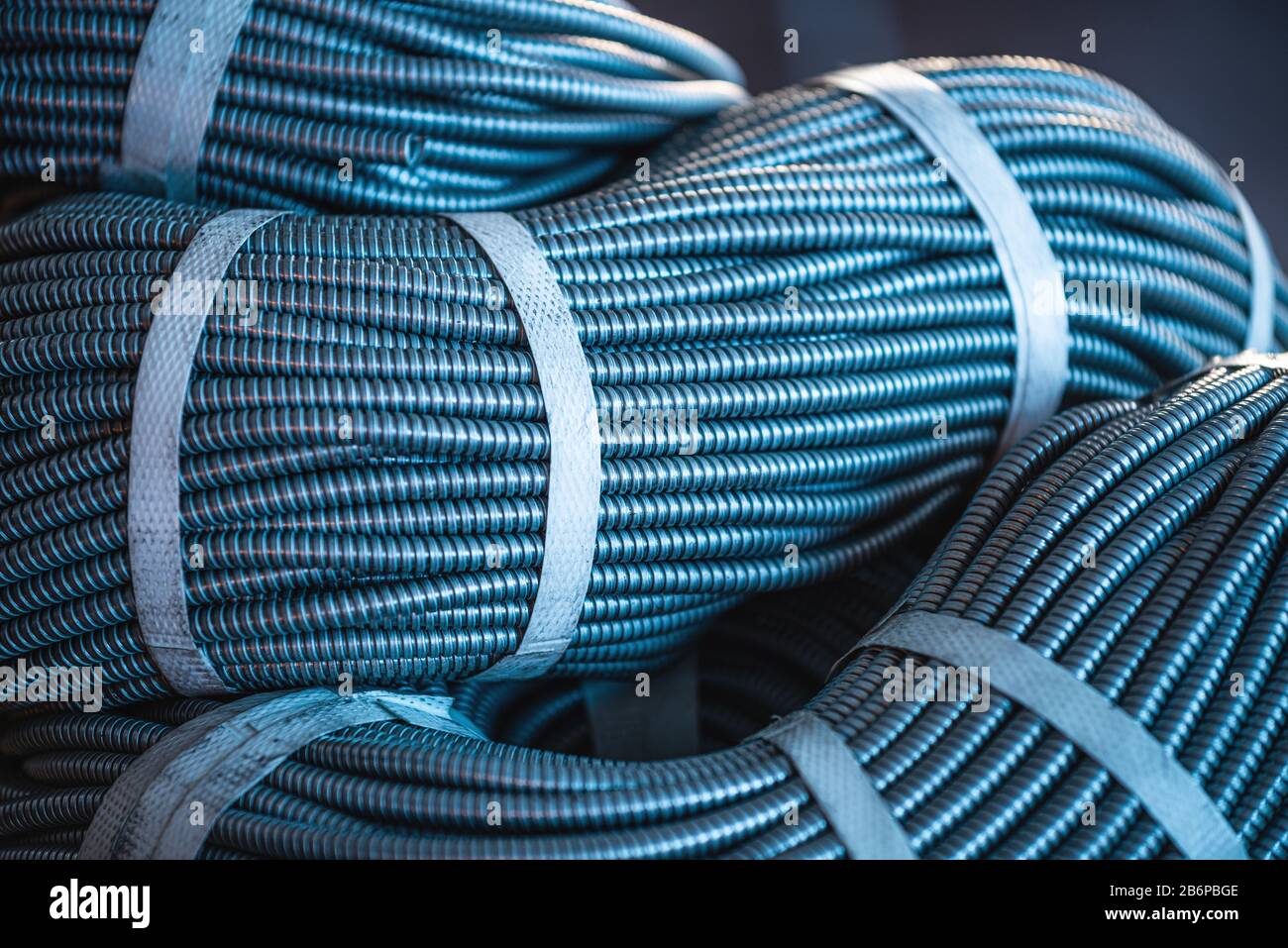 Close-up of a huge bundle of metal flexible tubes interconnected in ...