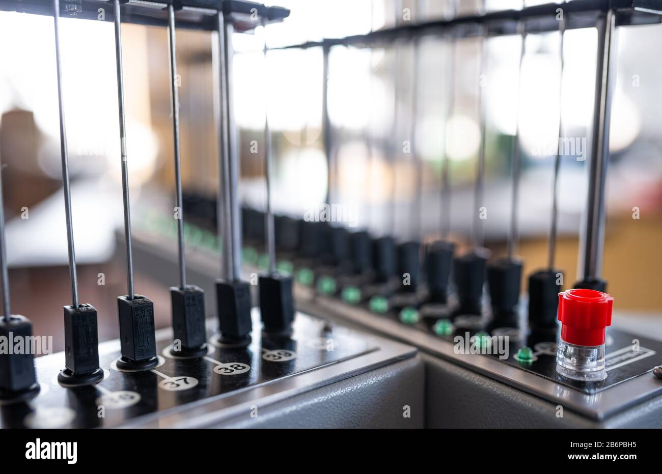 Close-up side view of metal antennas and numbered buttons on the metal ...