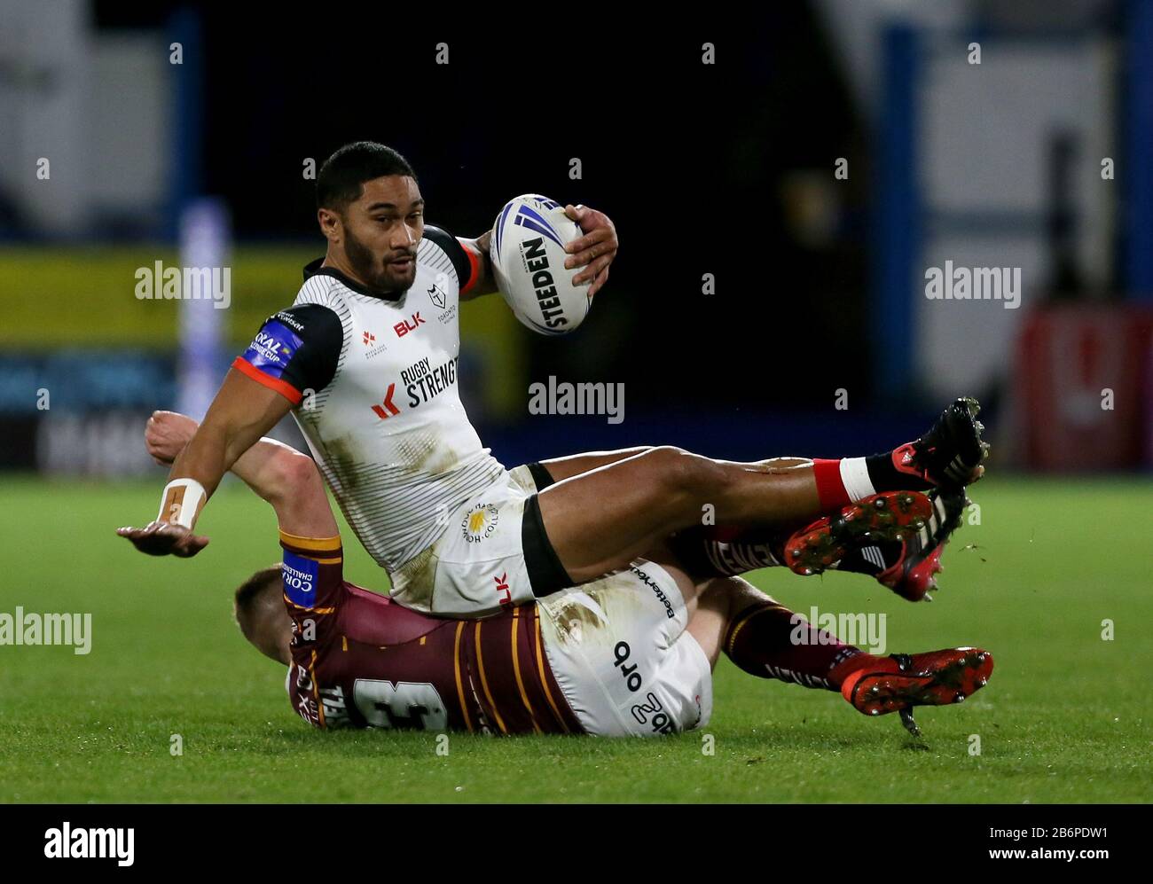 Toronto Wolfpack's Ricky Leutele and Huddersfield Giants Oliver Russell ...