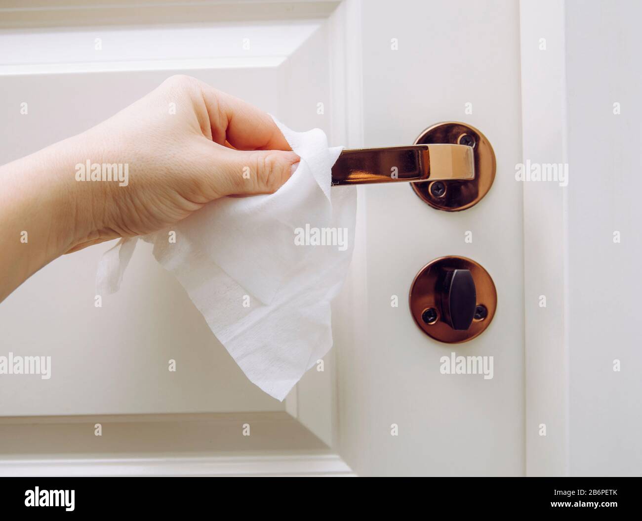 Close up view of woman hand using antibacterial wet wipe for ...