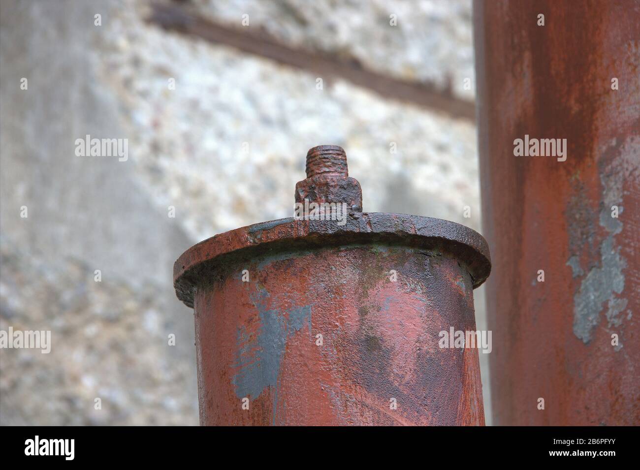 View of an eroded pipe with steel cover and screw connection Stock ...