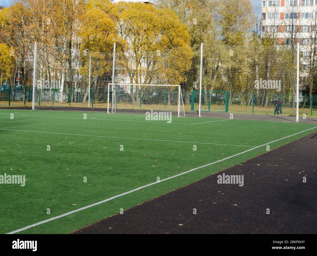 Soccer gates on artificial turf field Stock Photo - Alamy