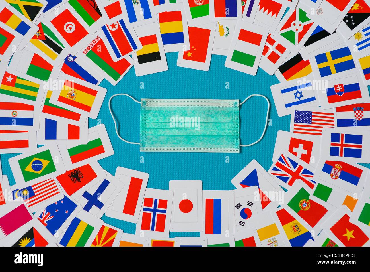 Surgical Mask and world flags, Covid-19, coronavirus pandemic concept ...