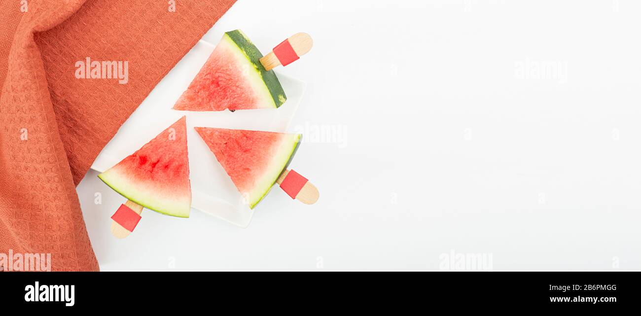 triangle sliced watermelon slice with stick. ice cream concept Stock ...