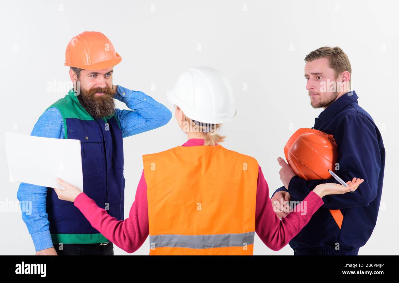 Misunderstanding concept. Men in hard hats and uniform and woman ...