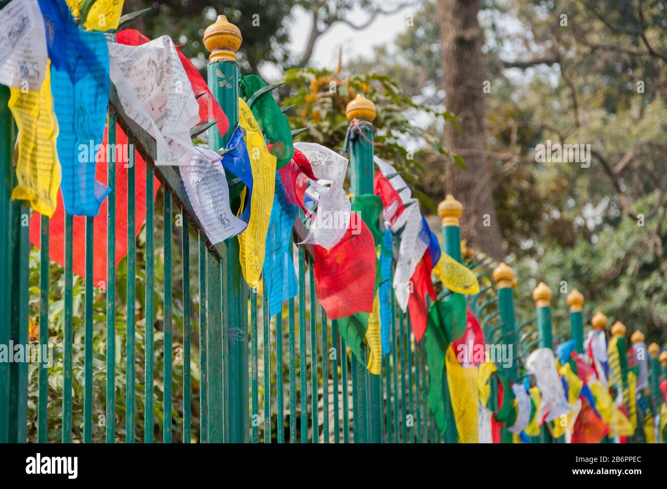 Gate with prayer flag hi-res stock photography and images - Alamy