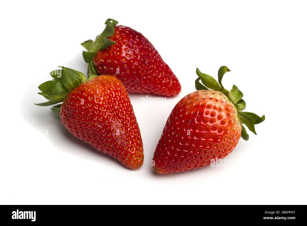 three fresh strawberries Stock Photo - Alamy