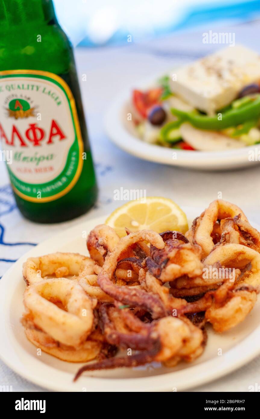 Calamari, greek salad and local beer for lunch Symi Town Symi Greek ...