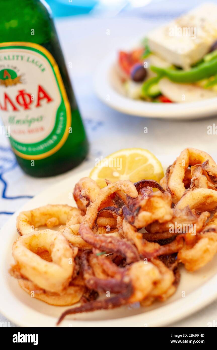 Calamari, greek salad and local beer for lunch Symi Town Symi Greek ...