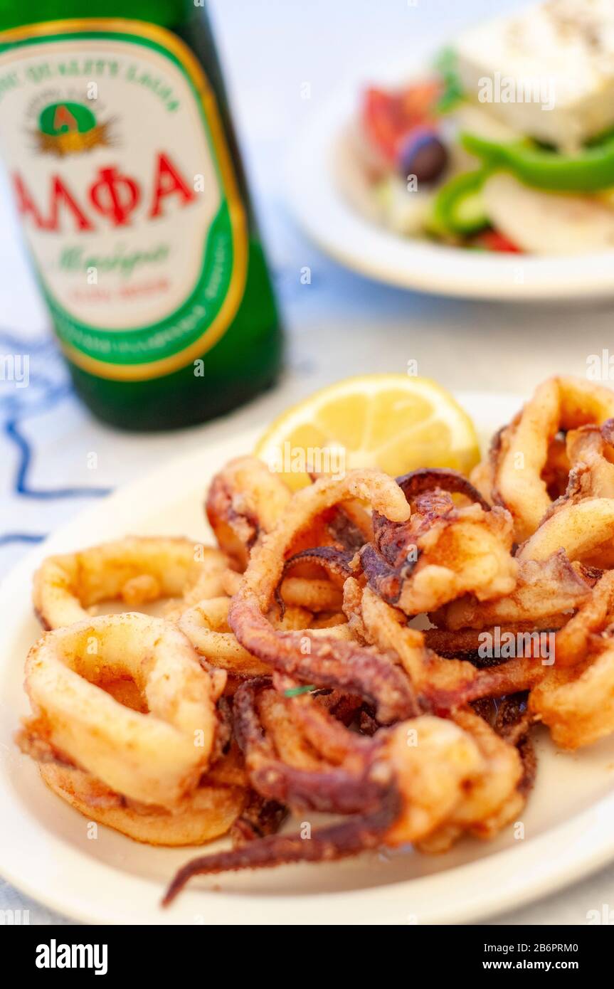 Calamari, greek salad and local beer for lunch Symi Town Symi Greek ...