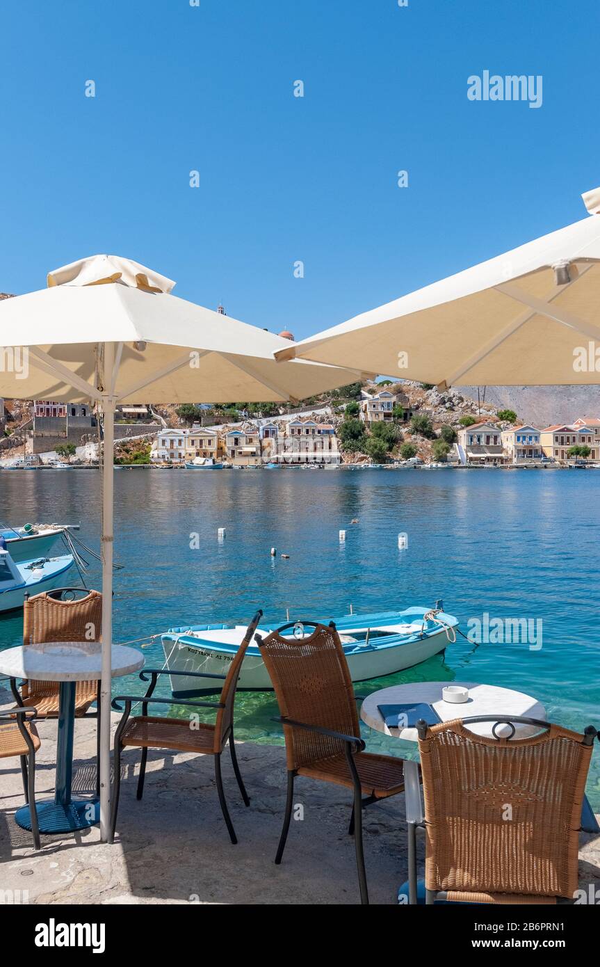 Harbourside restaurant Symi Town Symi Greek Islands Greece Stock Photo ...