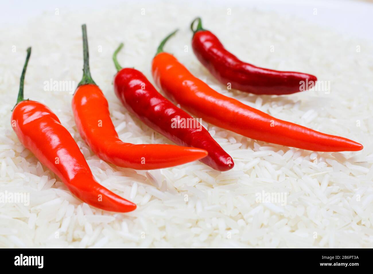 Red Chillis on Rice Stock Photo - Alamy
