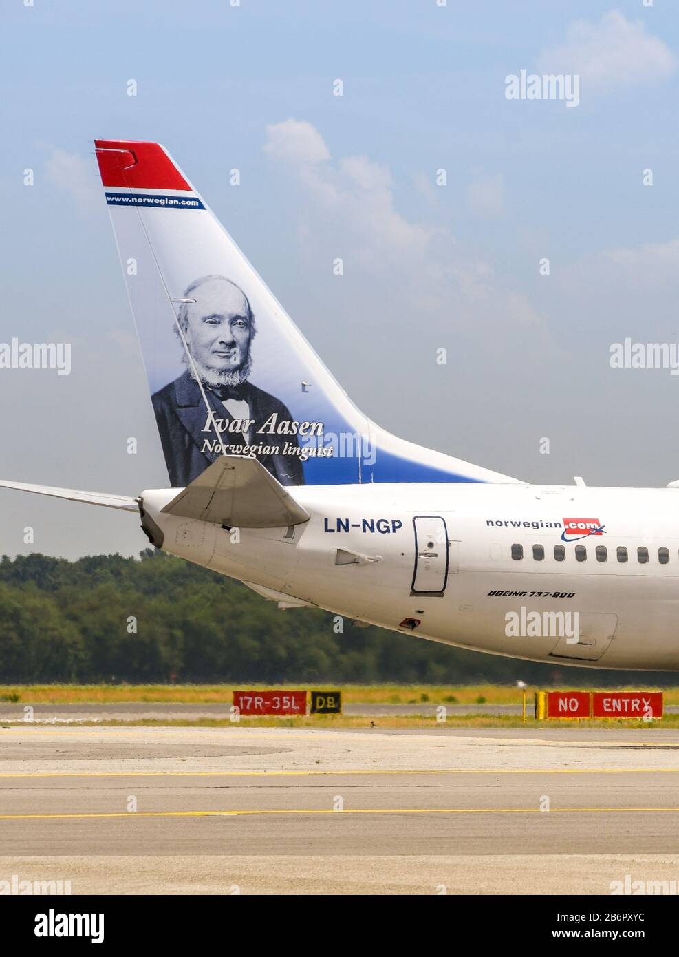 MILAN, ITALY - JUNE 2019: Tail fin of a Norwegian Air Boeing 737 jet at ...
