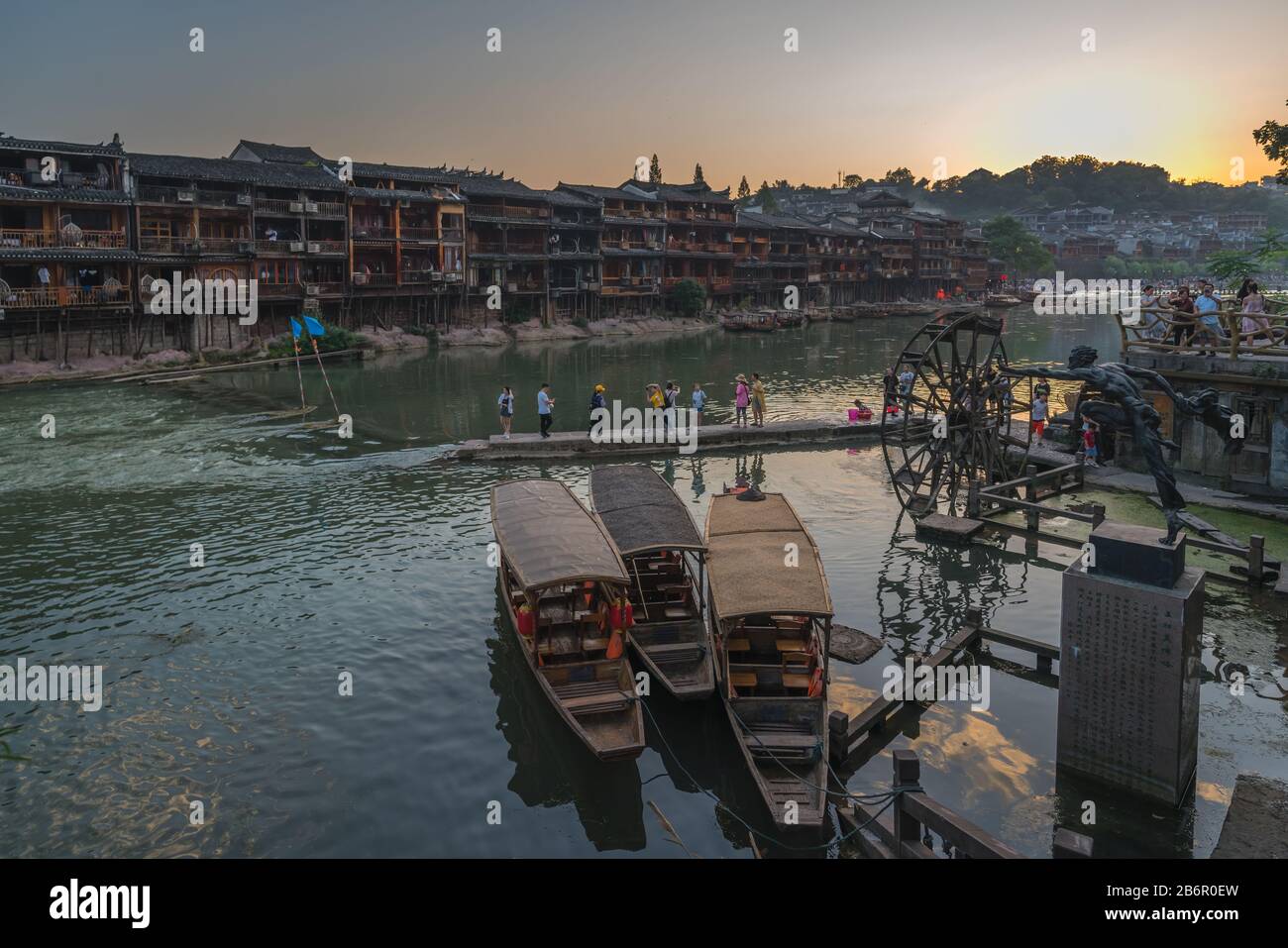 Feng Huang, China - August 2019 : Old historic wooden tourist boats on ...