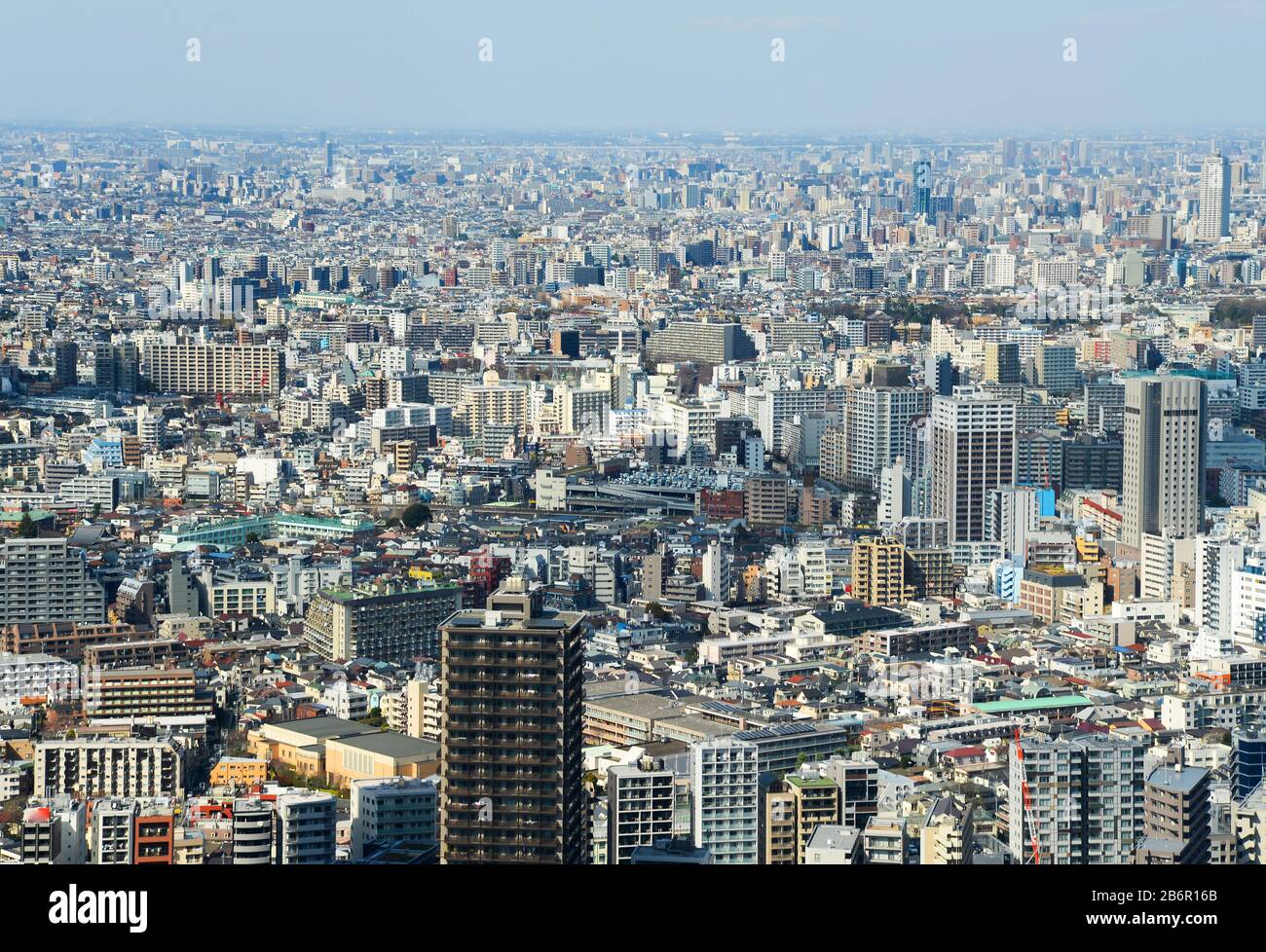 High angle view of Tokyo, Japan with countless buildings. Mix of high ...