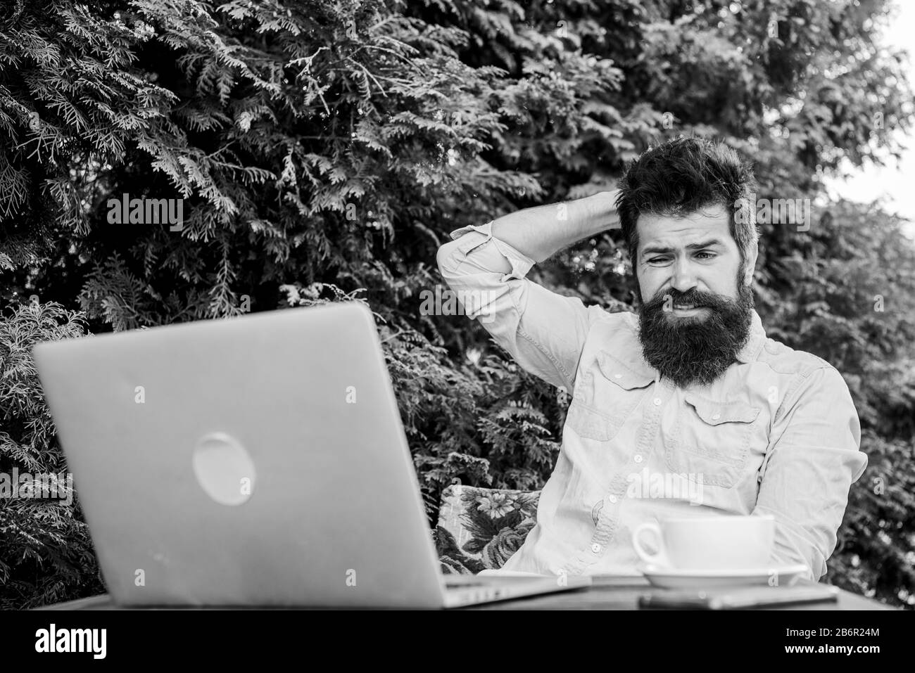 Online mass media worker. Write article for online magazine. Bearded ...