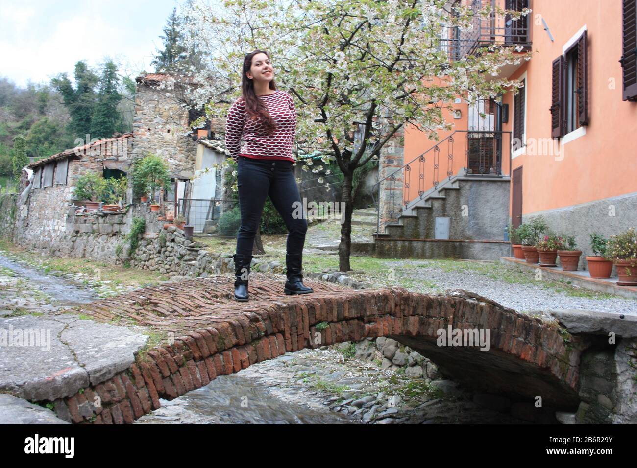 ruined paths built in stone and rock in the Tuscan landscape in Borgo a ...