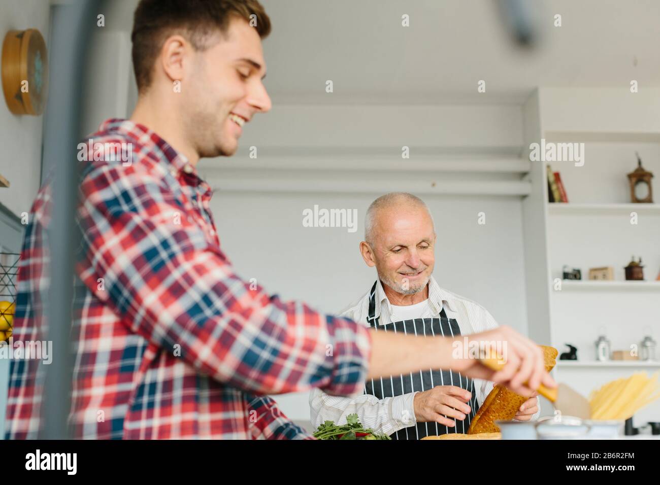 Young father son eating hi-res stock photography and images - Alamy