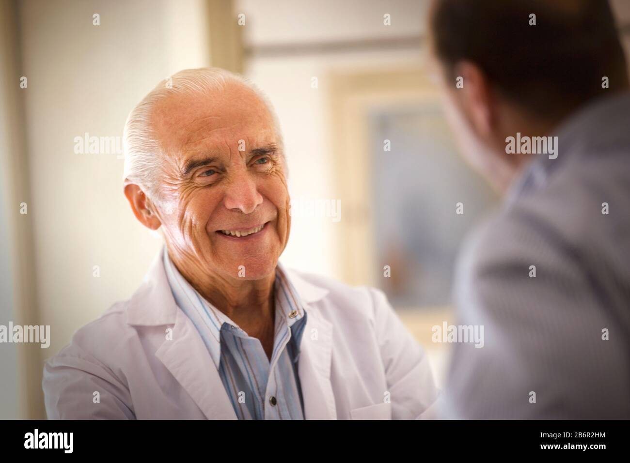 Two men are in a conversation Stock Photo - Alamy