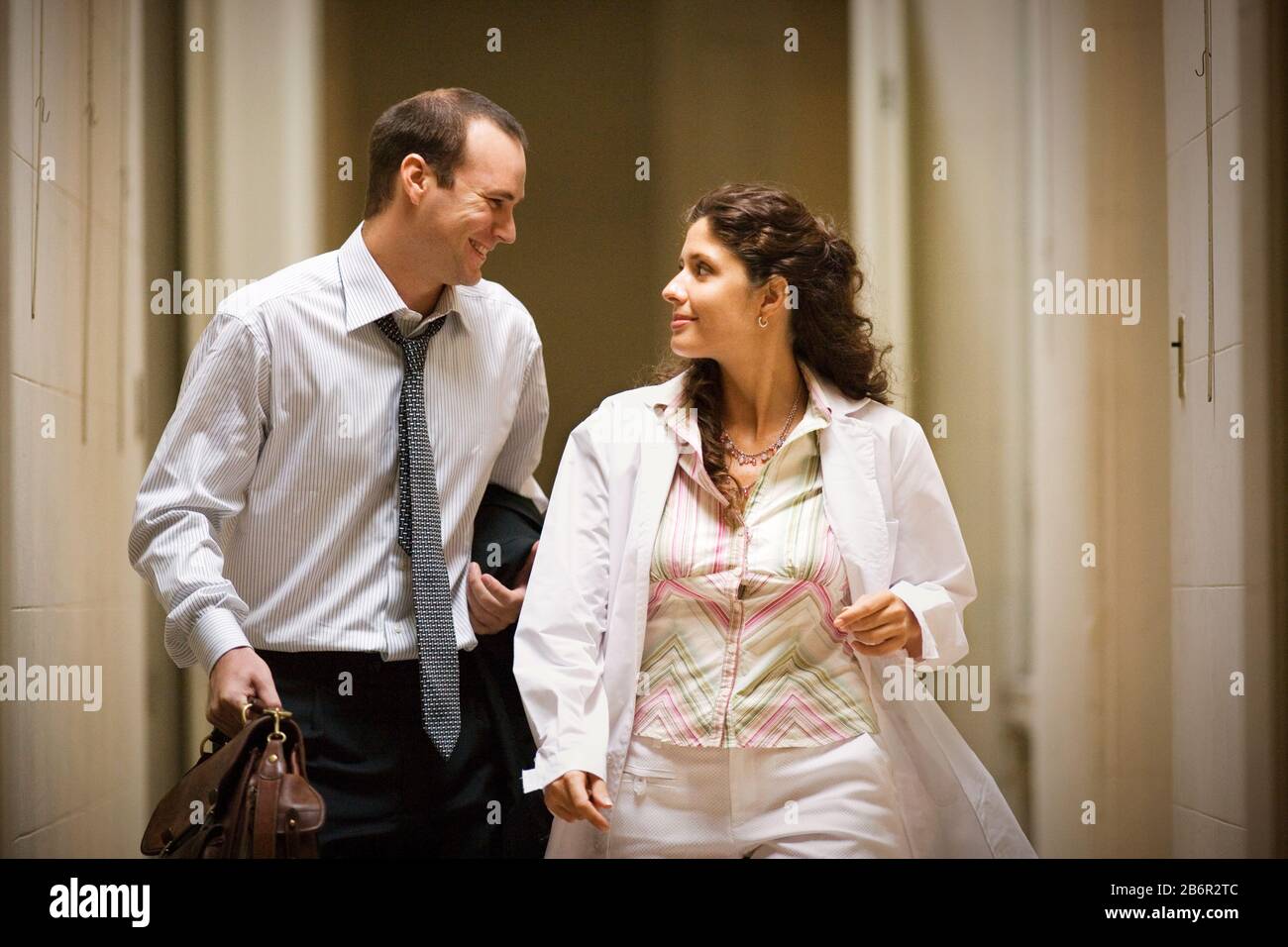View of two people in a conversation Stock Photo - Alamy