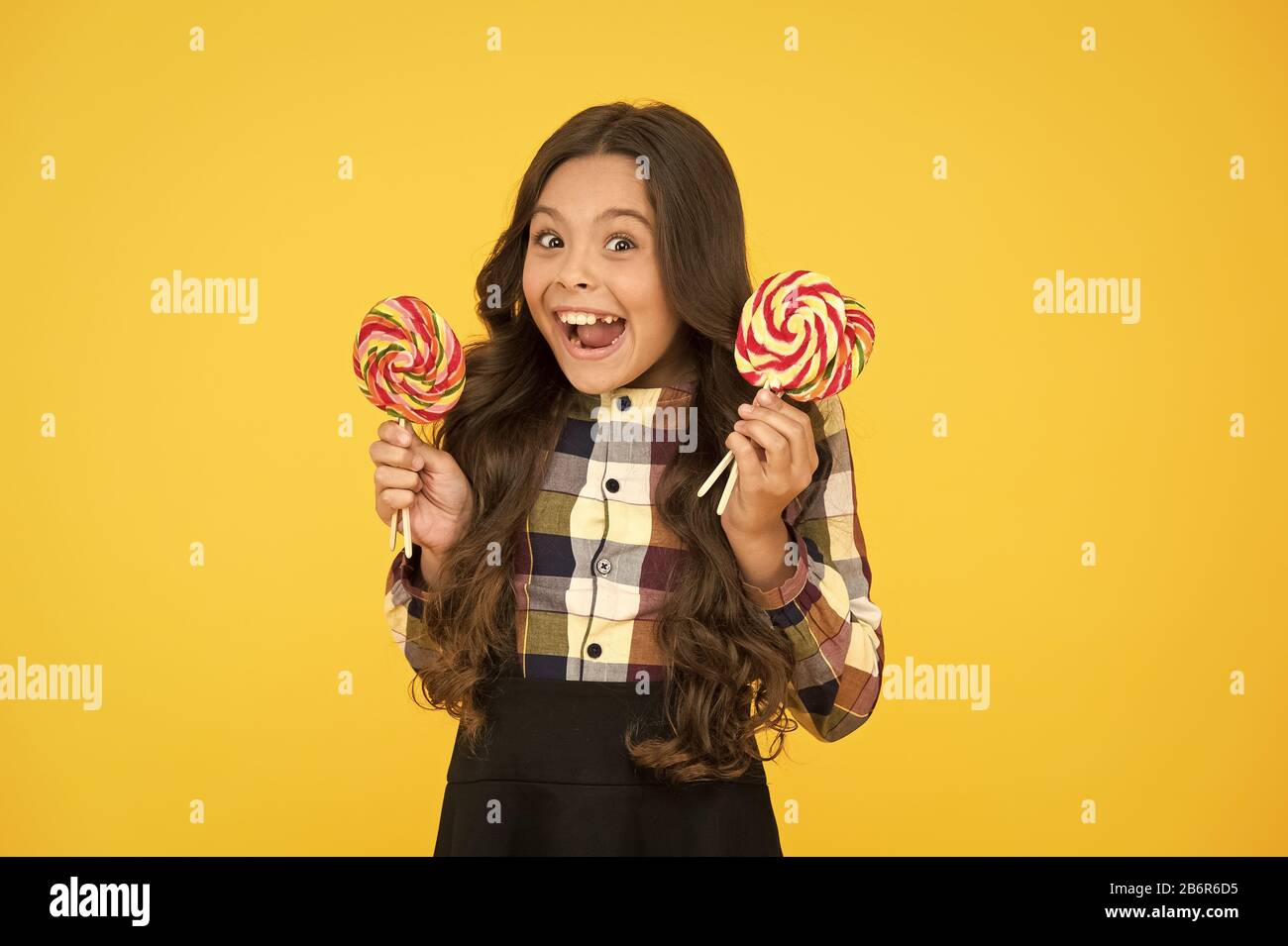 Happy kid with candy. School nutrition. Calories and energy. Harmful ...