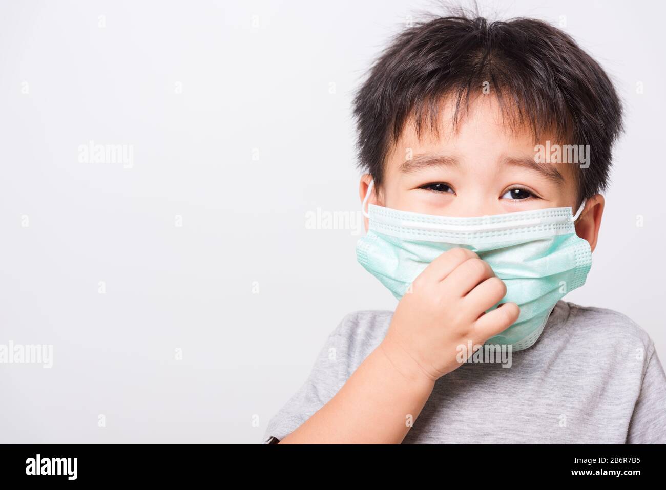 Closeup Asian face, Little children boy sick he using medicine ...