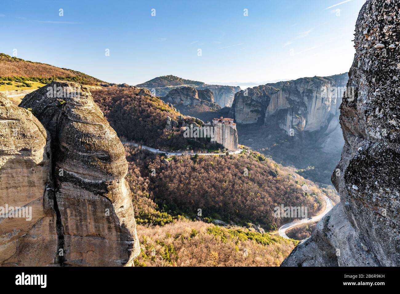 Aerial view of monastery Rousanou and breathtaking picturesque valley ...
