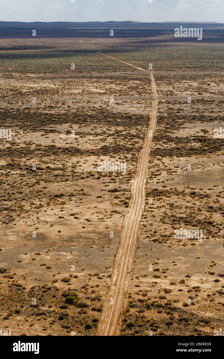 desert dirt road aerial view, middle of nowhere concept near the ...