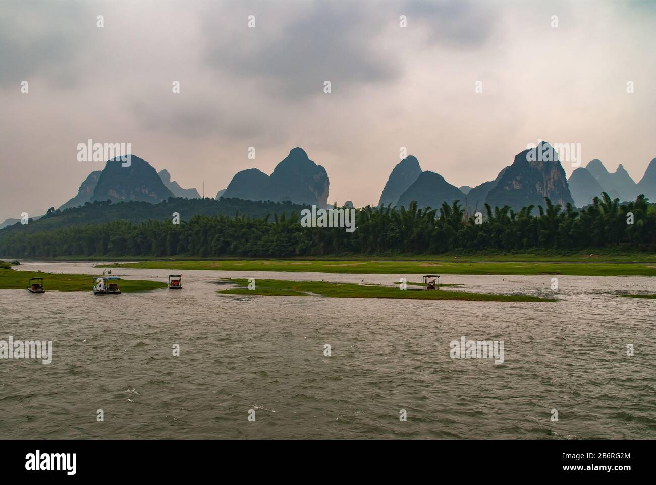 Guilin, China - May 10, 2010: Along Li River. Landscape with many karst ...