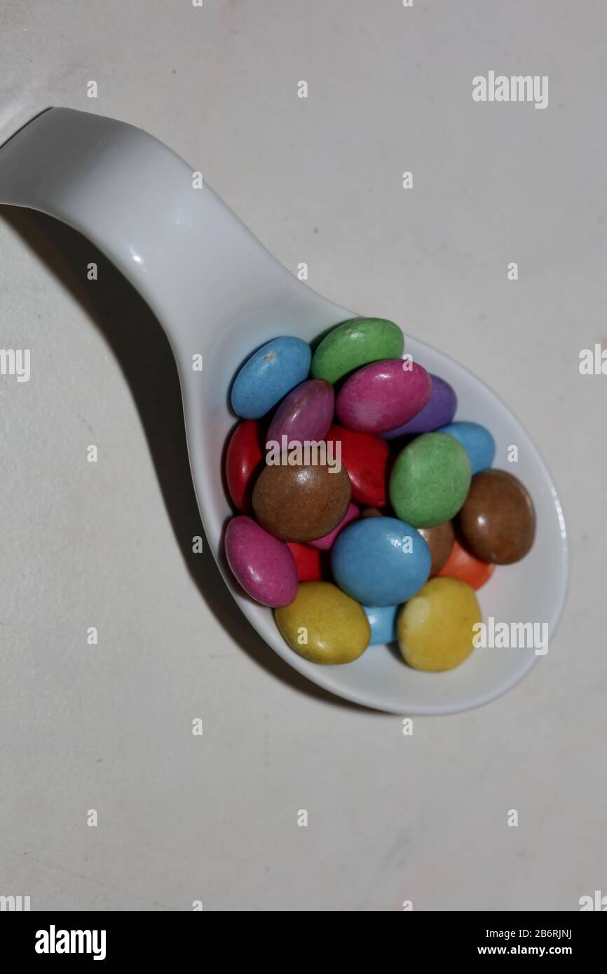 Smarties sweets macro background high quality Stock Photo - Alamy