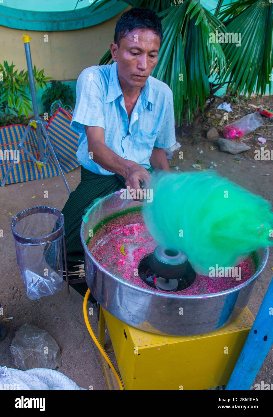Burmese man selling Cotton Candy in a market in Shan state Myanmar ...