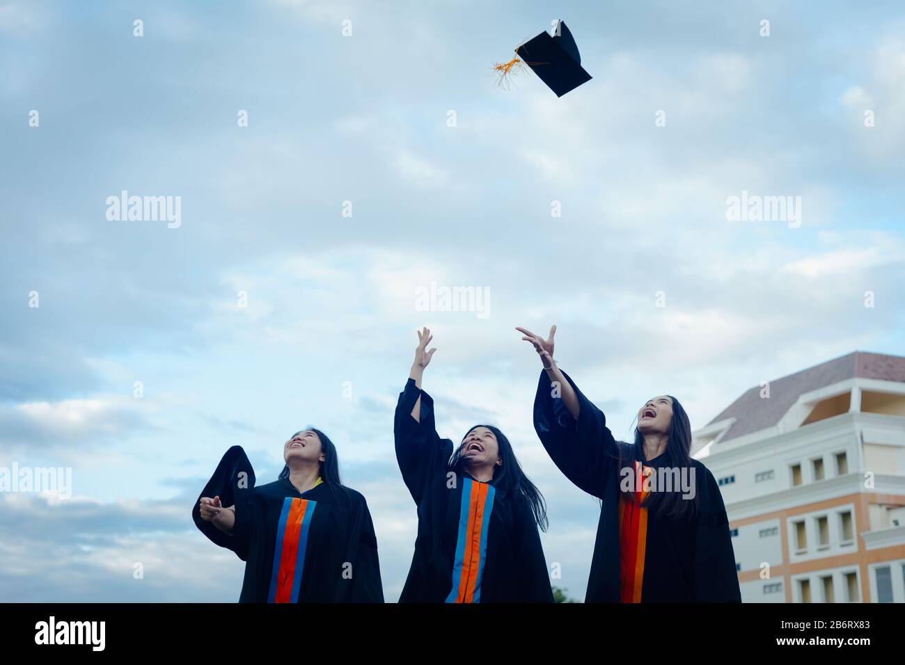 The university graduates having fun and enjoy for degree award in the ...