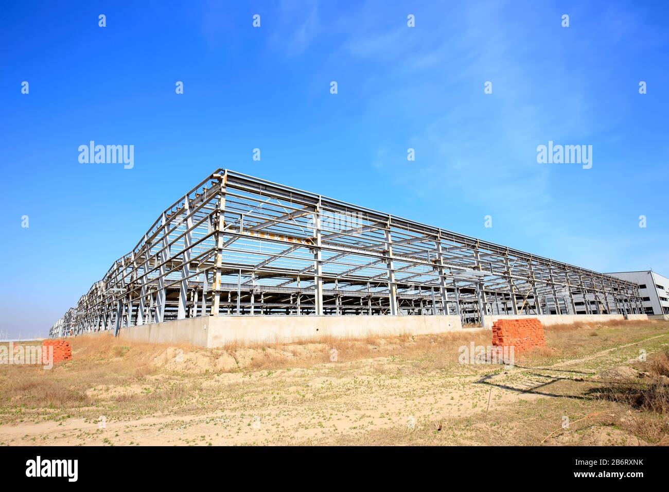 Steel frame structure at construction site Stock Photo - Alamy