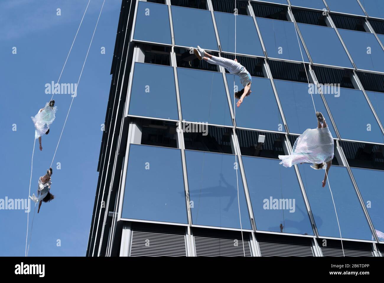 New York, NY - March 11, 2020: Vertical performers BANDALOOP performs during opening of highest ...