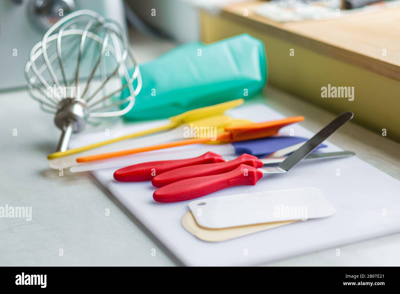 Set of multi-colored silicone spatulas, kitchen tools. Sweet pastries ...