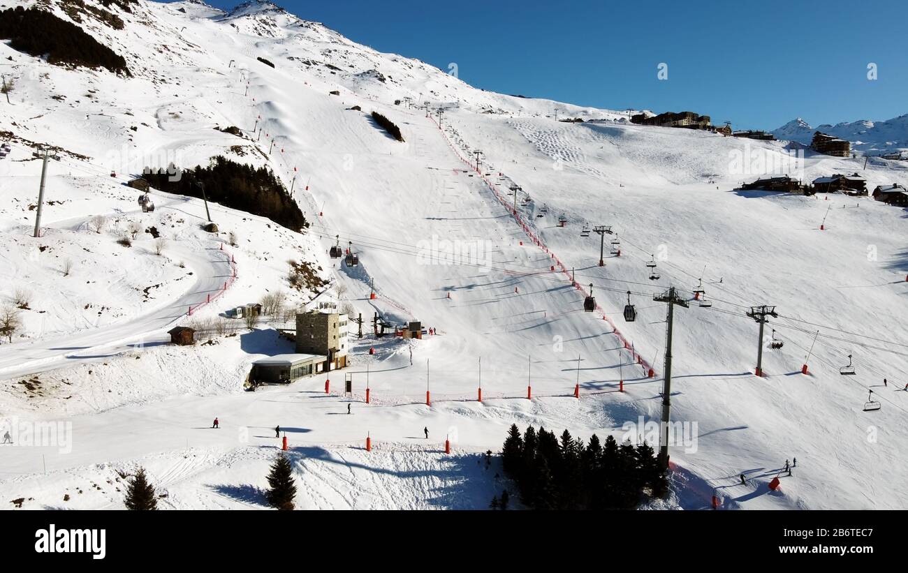 Majestic winter landscape and ski resort with typical alpine wooden ...