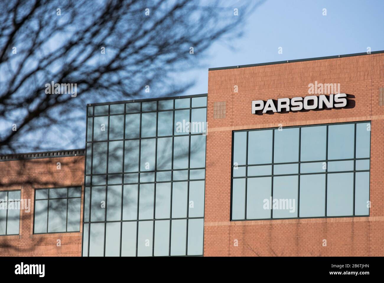 A logo sign outside of a facility occupied by Parsons Corporation in ...