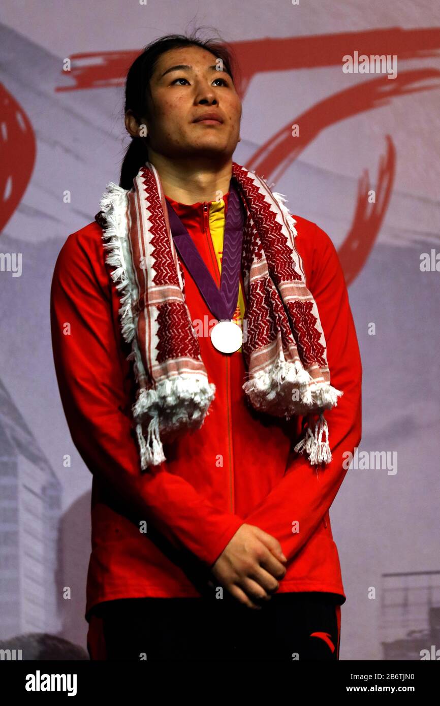 Amman, Jordan. 11th Mar, 2020. Gold medallist Li Qian of China reacts ...