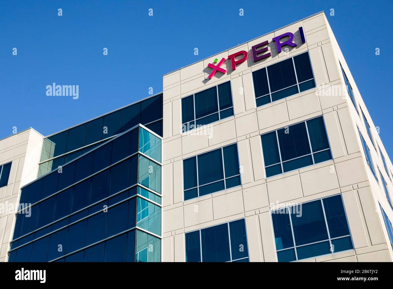 A logo sign outside of a facility occupied by Xperi Corporation in ...