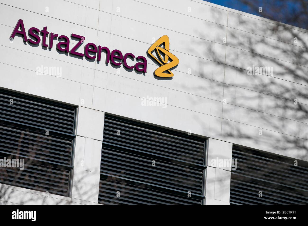 A logo sign outside of a facility occupied by AstraZeneca in Germantown ...